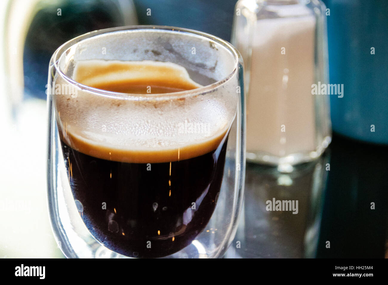 Photograph of a transparent cup of coffee Stock Photo - Alamy