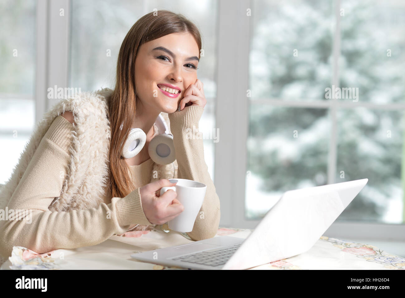 Girl drinking tea Stock Photo - Alamy