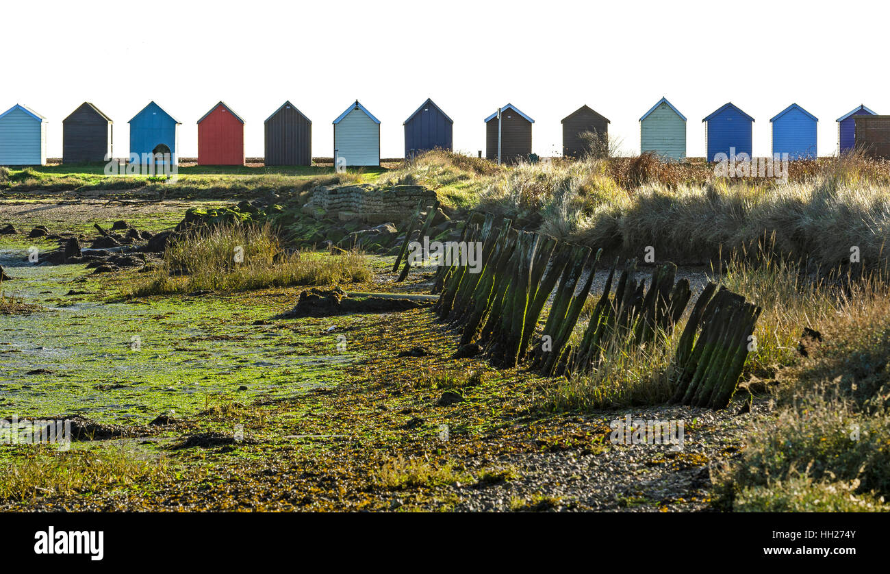 salt marsh at calshot spit looking towards the beach huts Stock Photo ...