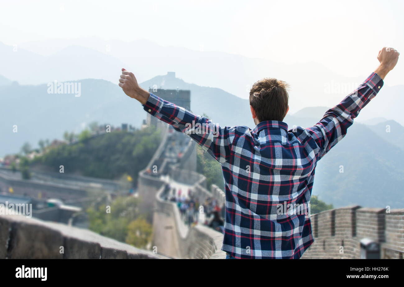 Happy man at the Great wall of China Stock Photo - Alamy