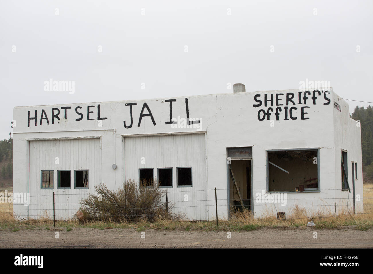 Old abandoned building with the words Hartsel Jail painted on it in ...