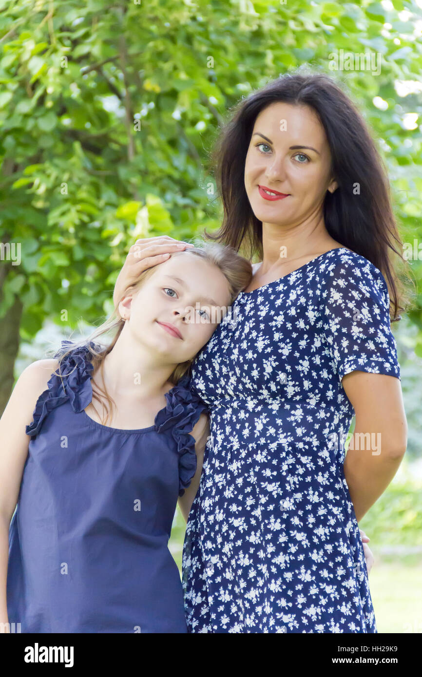 Portrait beautiful mother and daughter in summer Stock Photo - Alamy