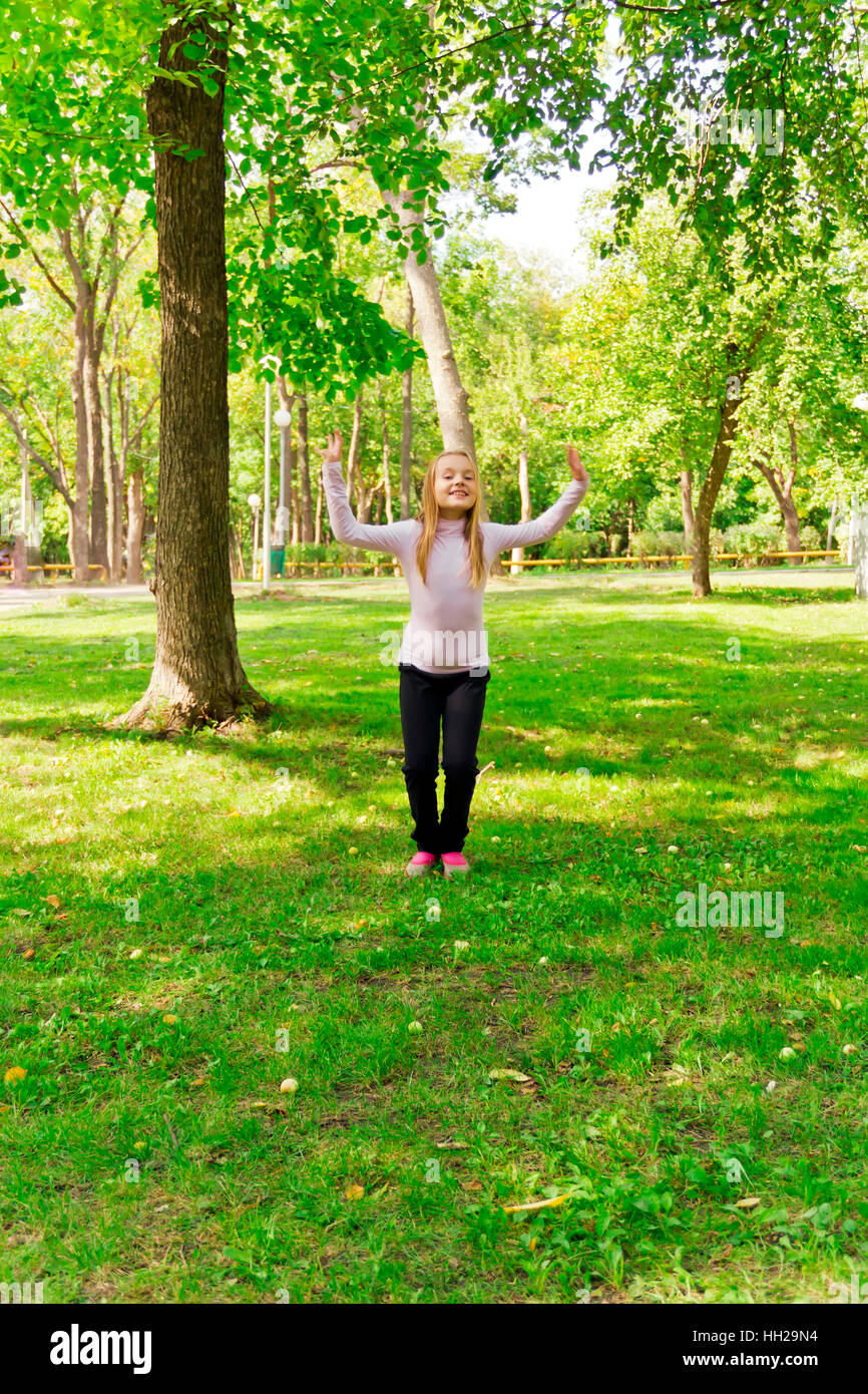 Photo of cute jumping girl in summer Stock Photo - Alamy