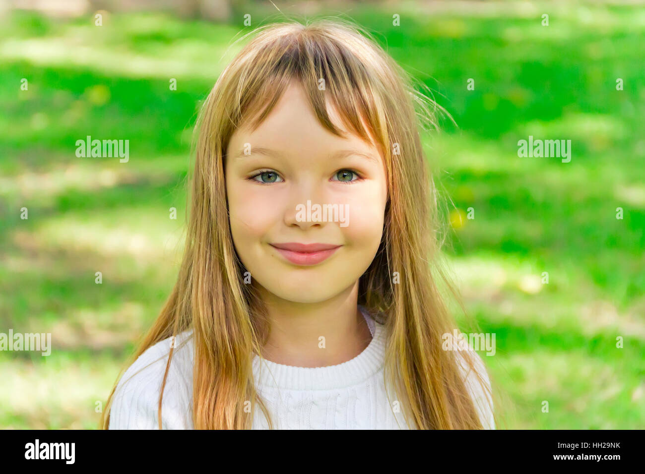 Photo of cute girl with long hair Stock Photo - Alamy