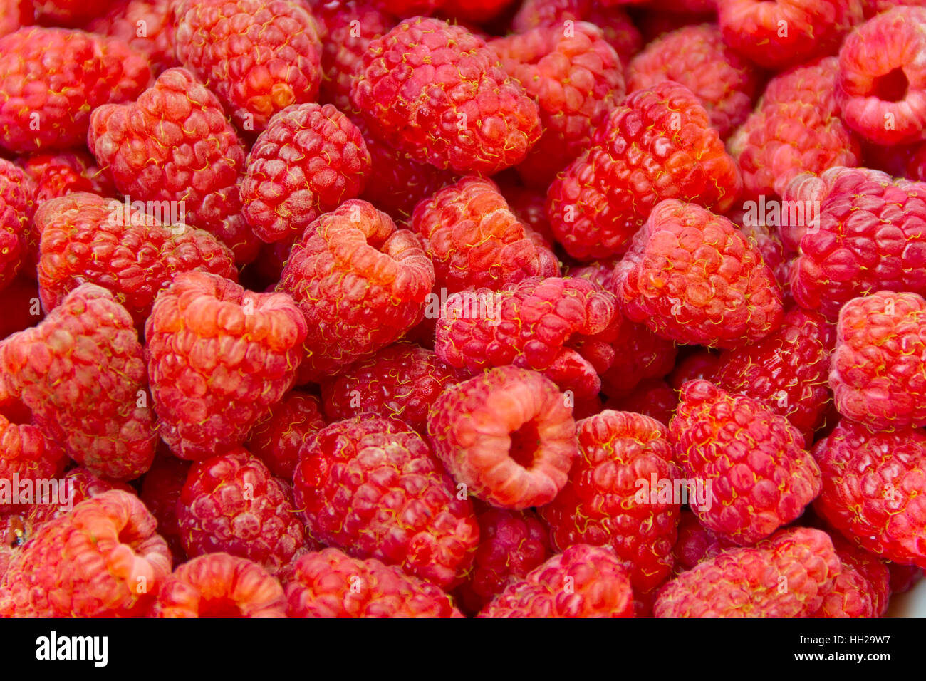 Photo of the background fresh red raspberry Stock Photo - Alamy