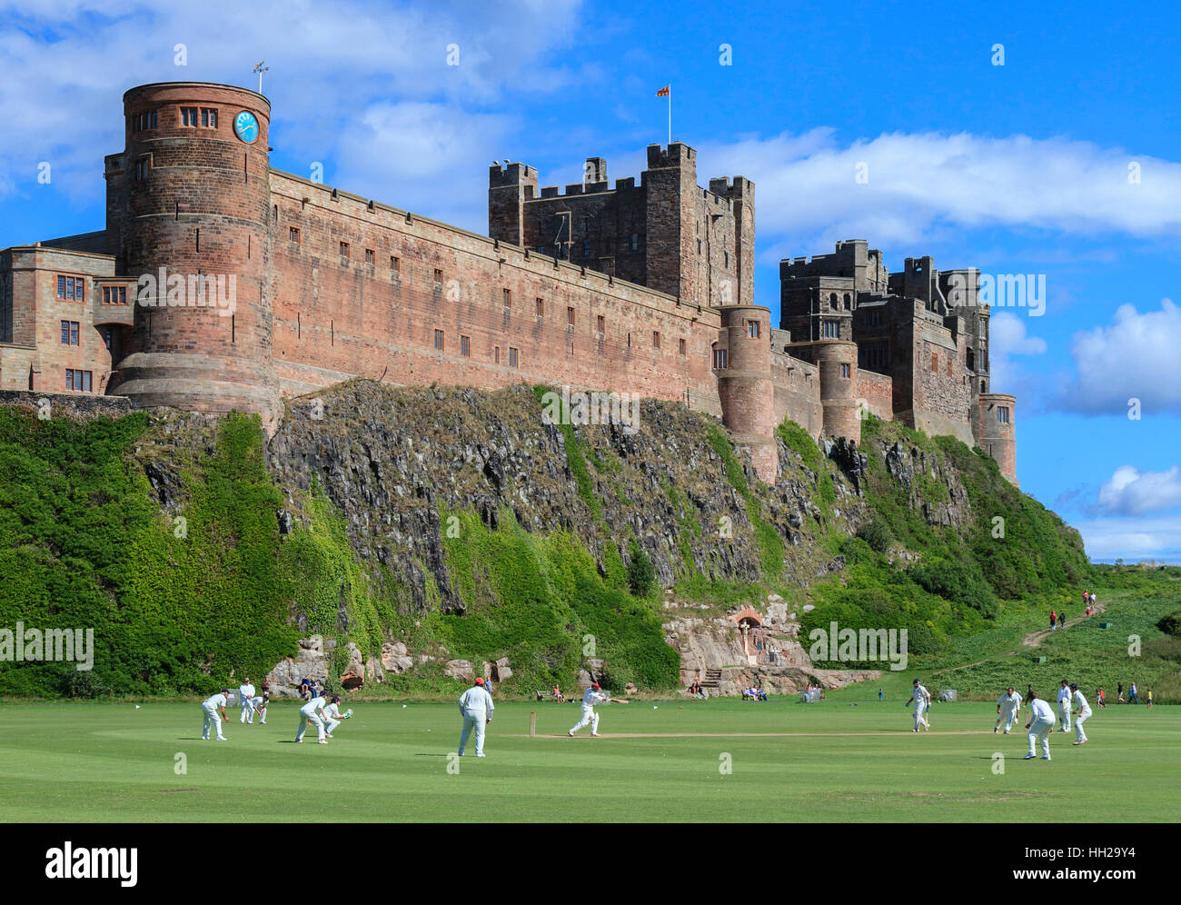 Quintessential England? Cricket being played under the imposing edifice ...