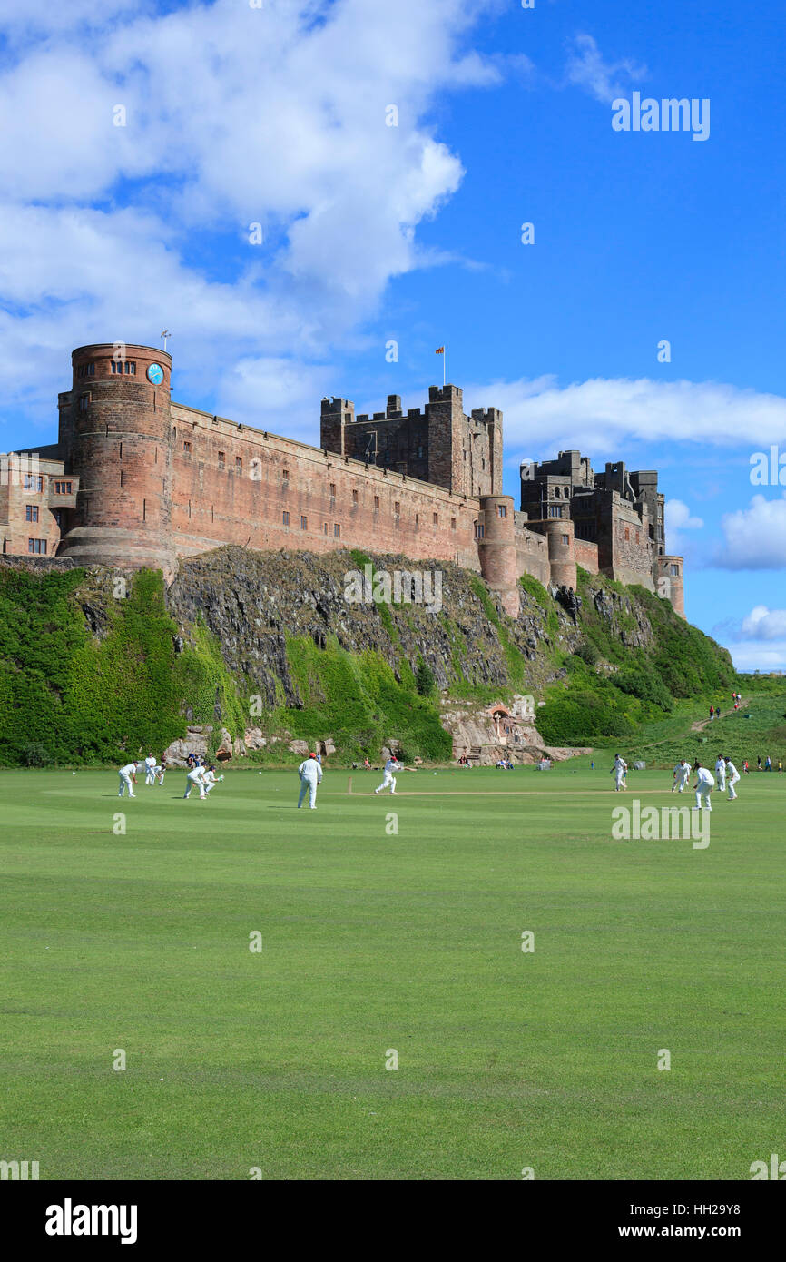 Quintessential England? Cricket being played under the imposing edifice ...