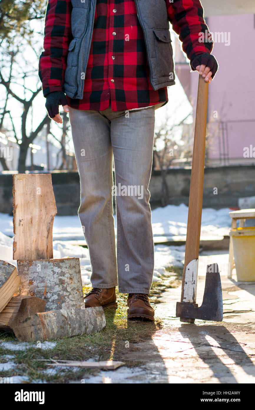 Cutting tree with axe hi-res stock photography and images - Alamy