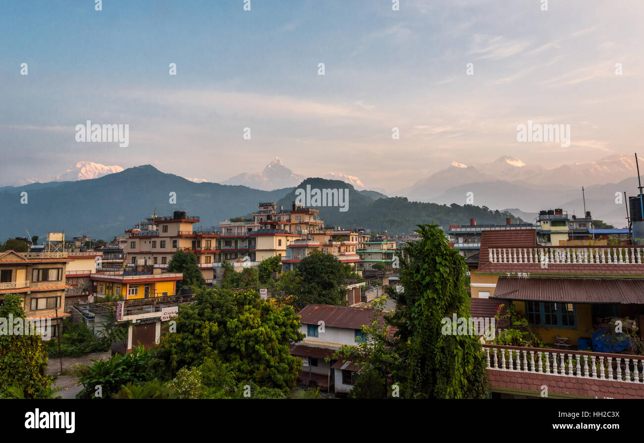 Morning rooftop view of mountains rising in distance Stock Photo - Alamy