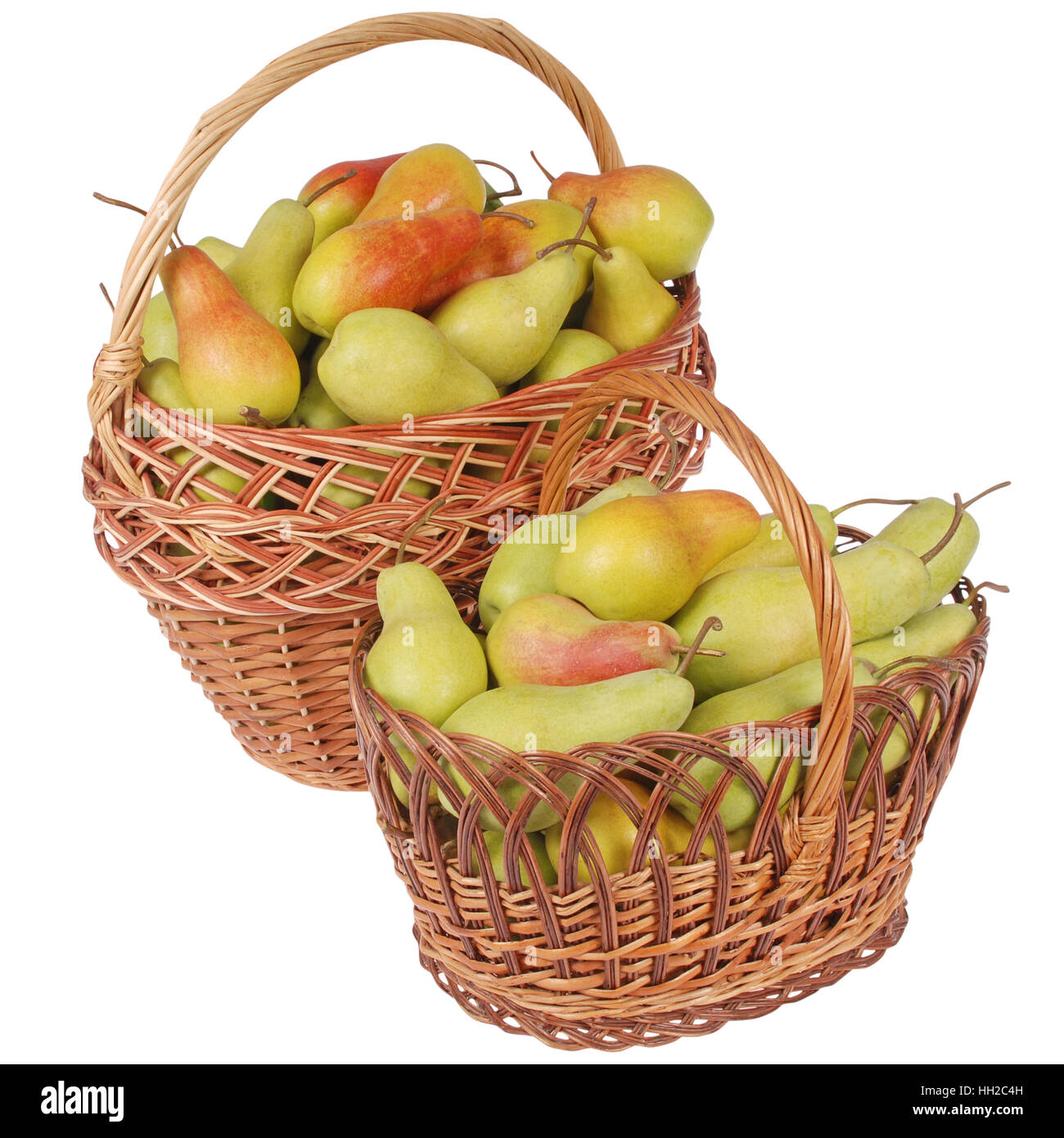 Pears in a basket on white background. Clipping path included Stock ...