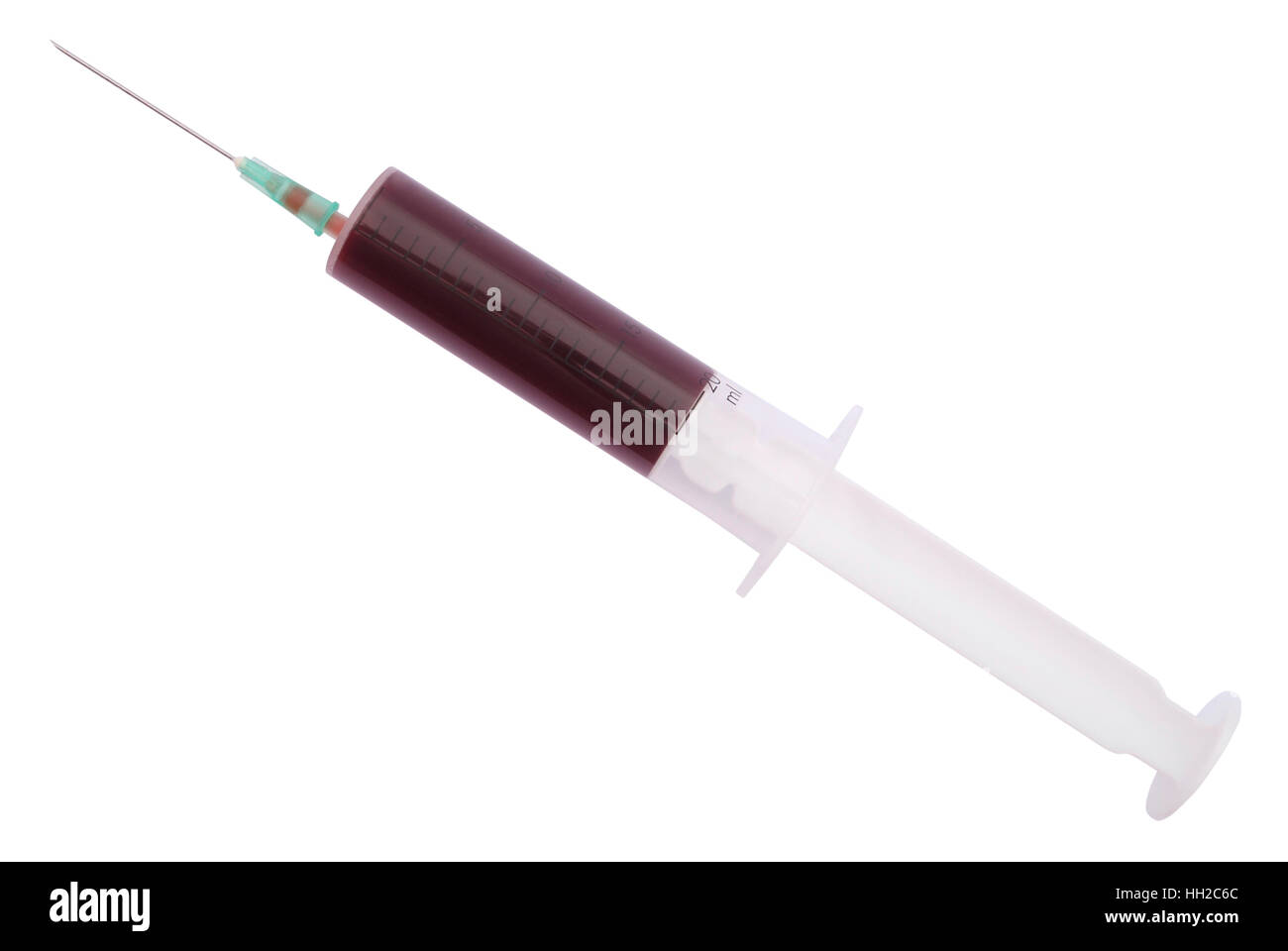 A simple plastic syringe syringe with blood on white background ...