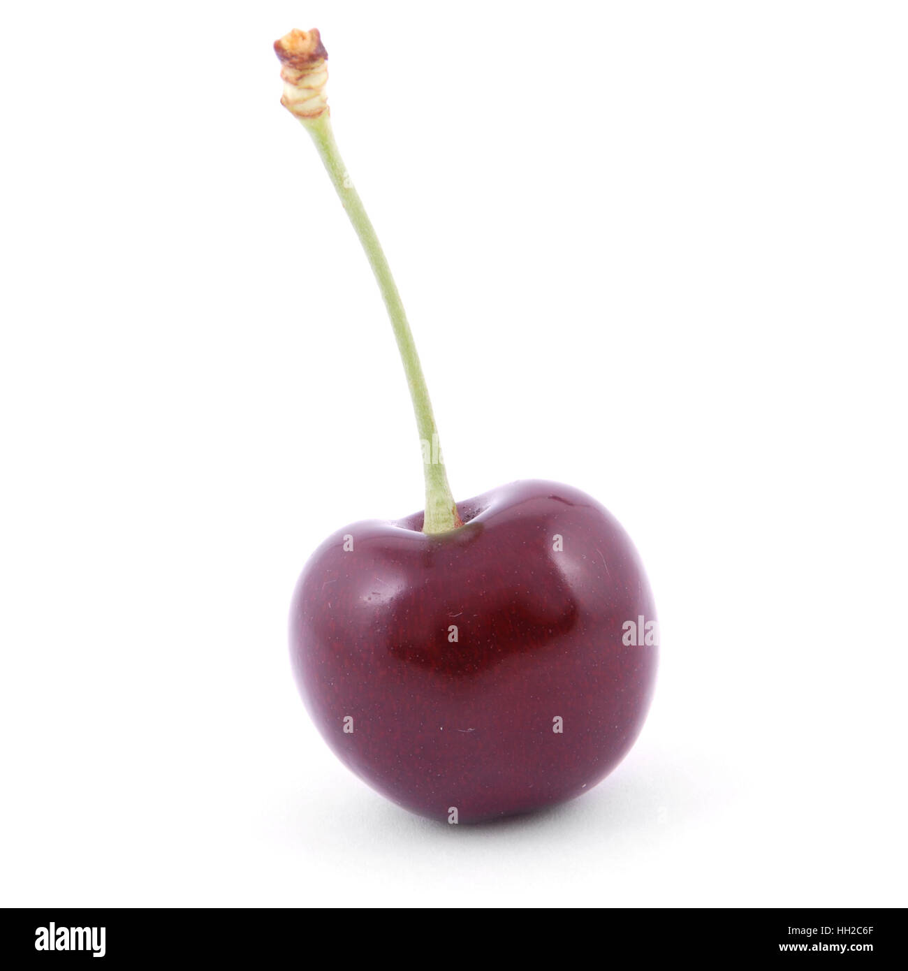 Red cherries on white background Cut Out Stock Images & Pictures - Alamy