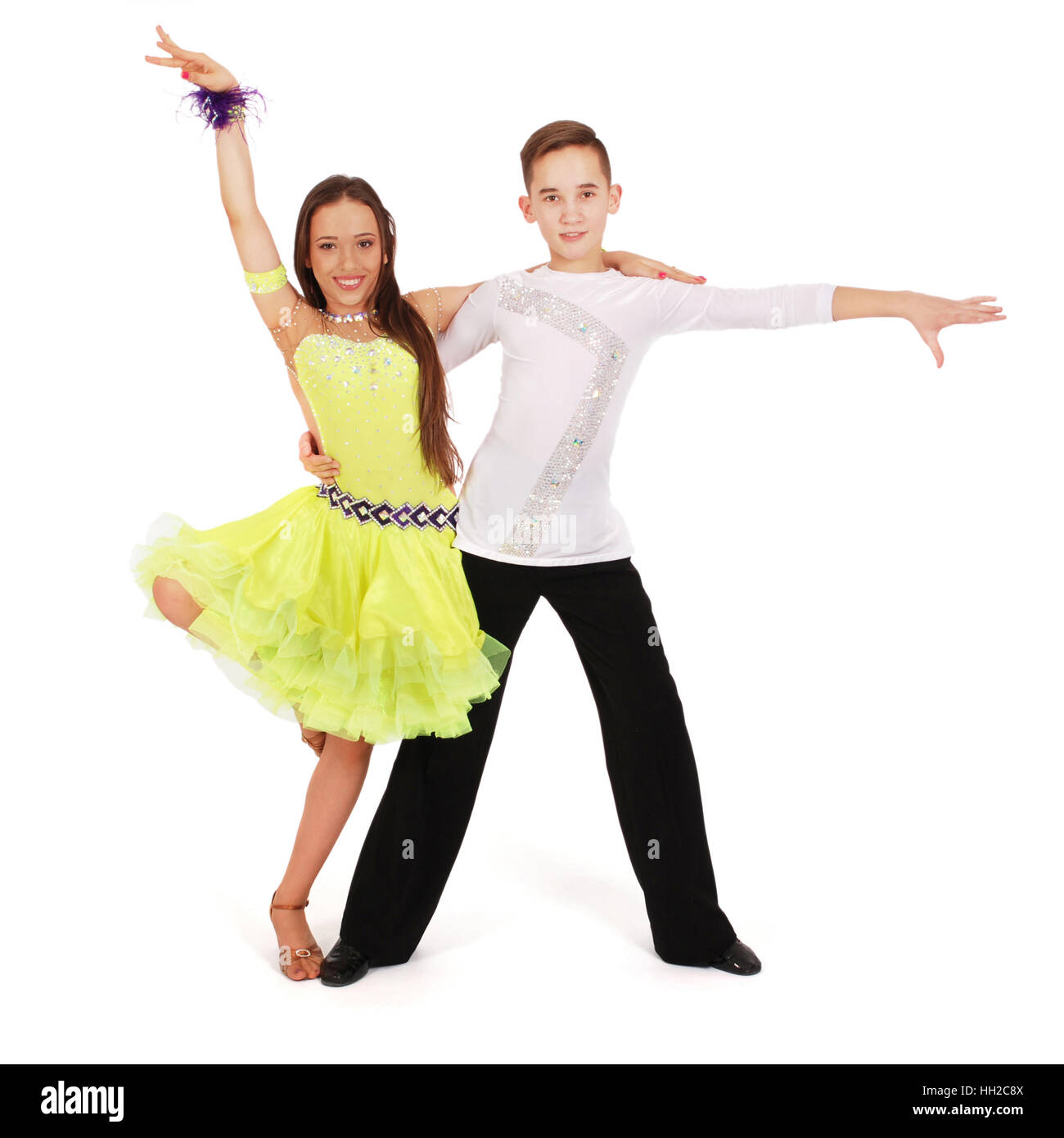 Boy and girl dancing ballroom dance on white background Stock Photo - Alamy
