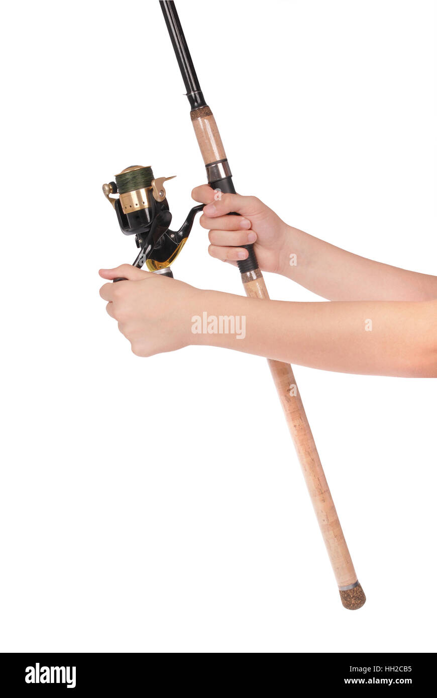 fishing rod, reel in hands, isolated over white background Stock Photo ...