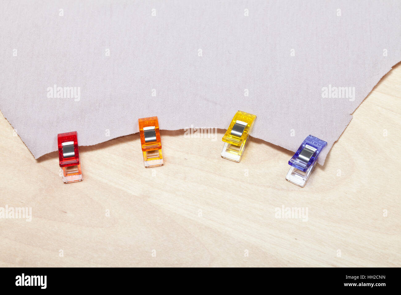 Clamps on fabric Stock Photo - Alamy