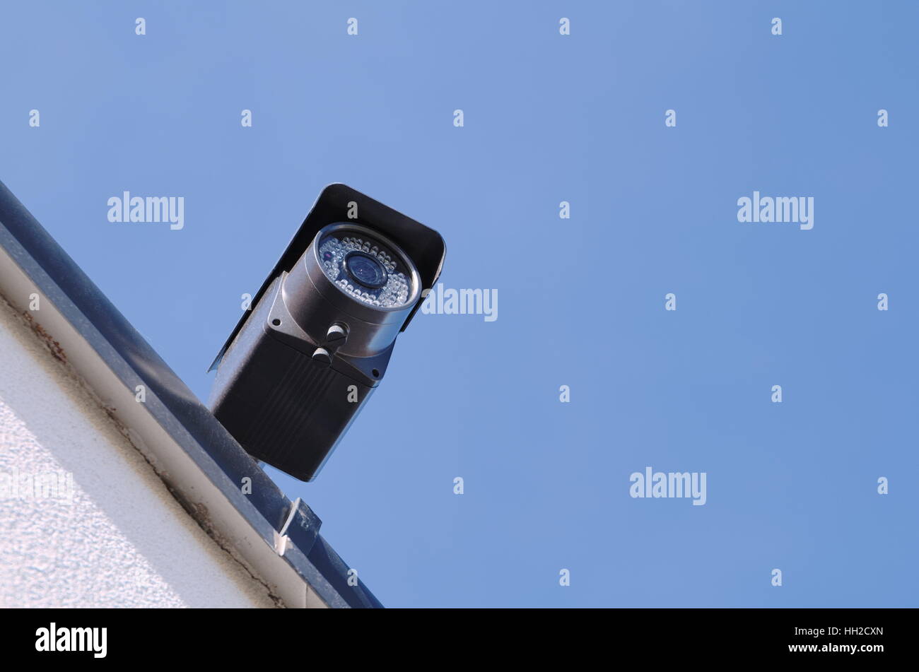 Security Camera Closeup Bottom View with Clear Blue Sky Daytime Stock ...