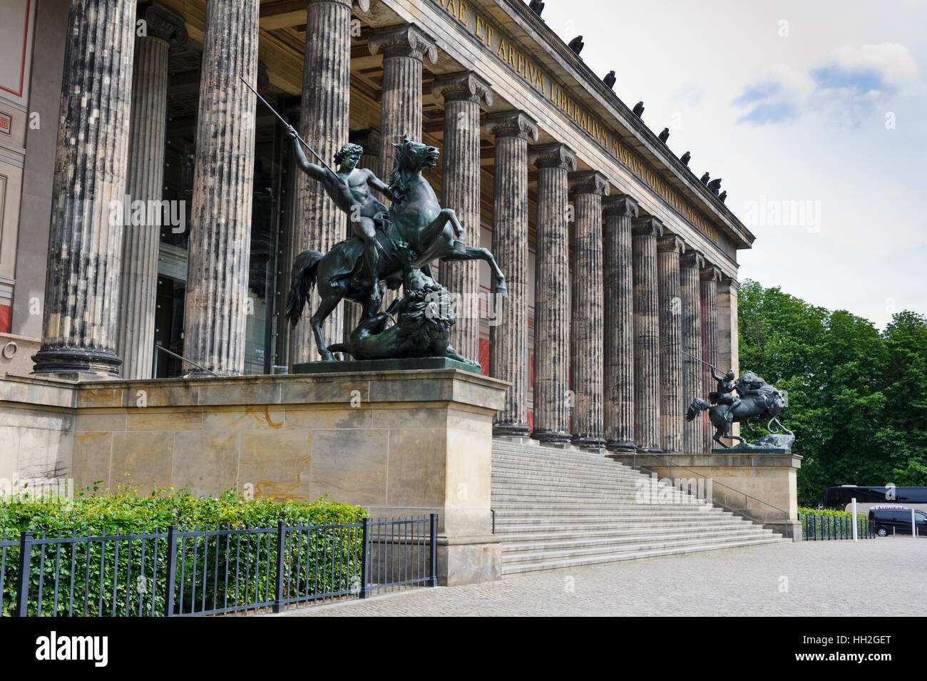 Two bronze sculptures at the entrance of the the Altes Museum, Berlin ...