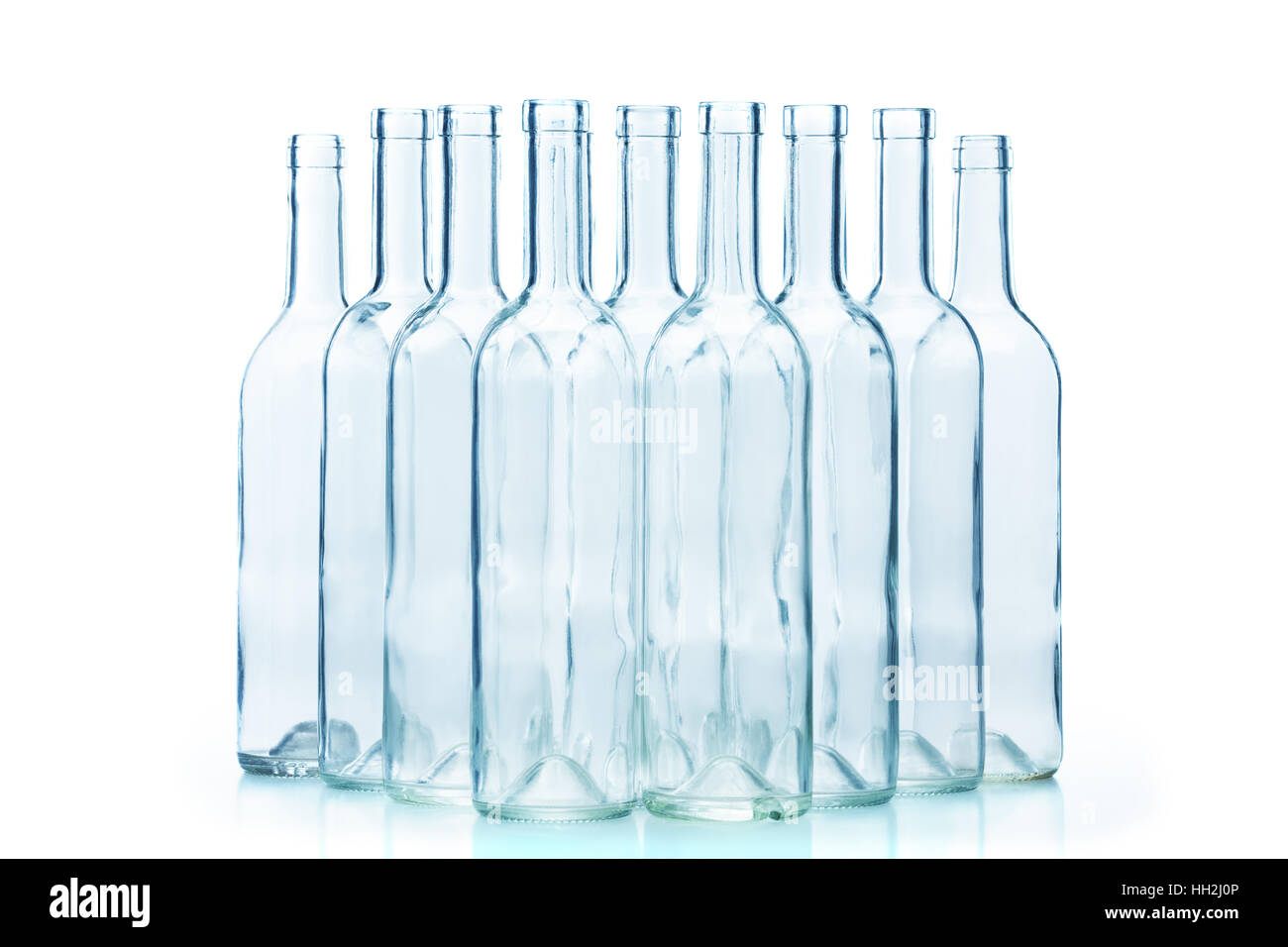 Group of empty glass bottles isolated on white Stock Photo - Alamy