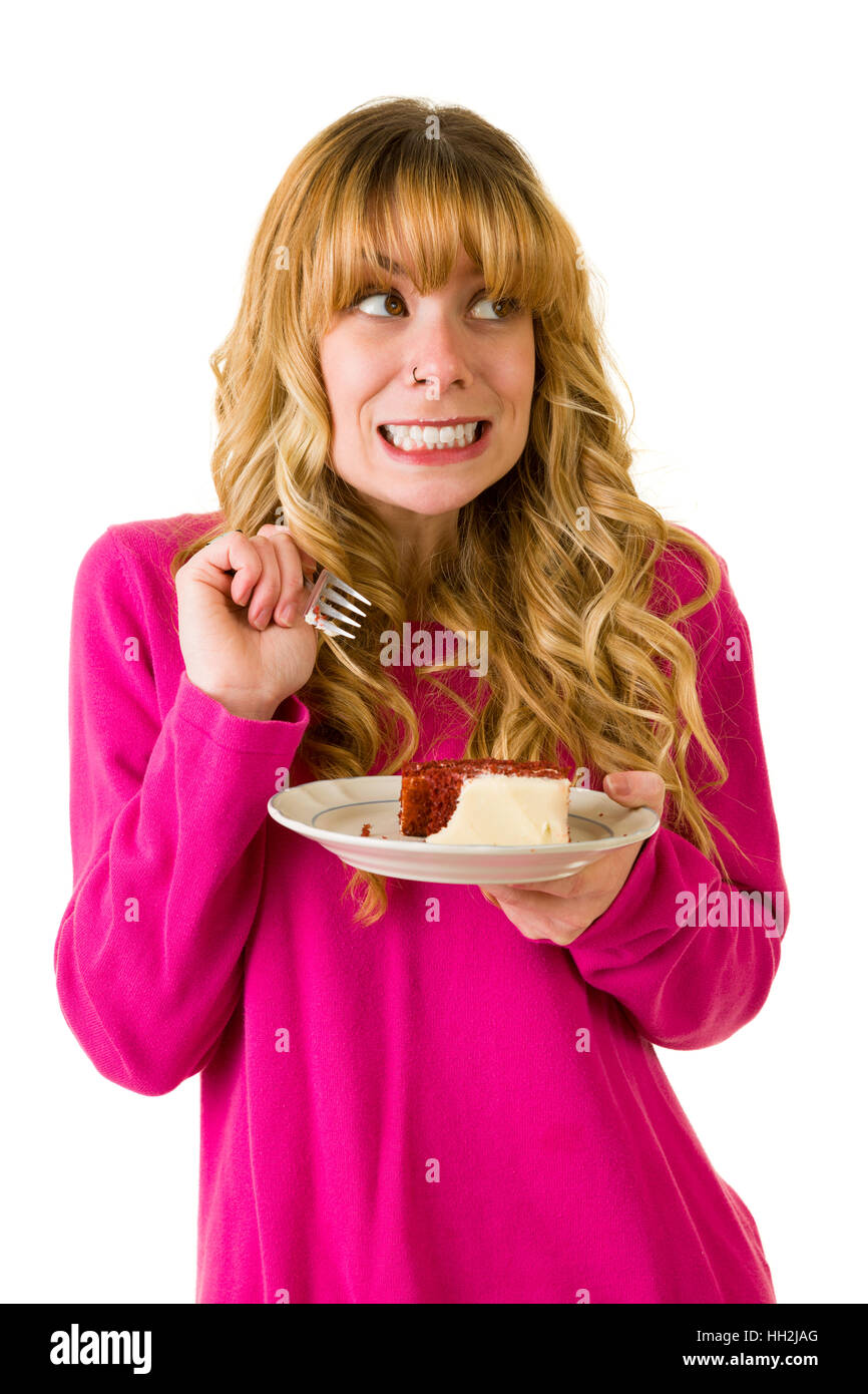 Attractive blonde woman eating cake hi-res stock photography and images ...