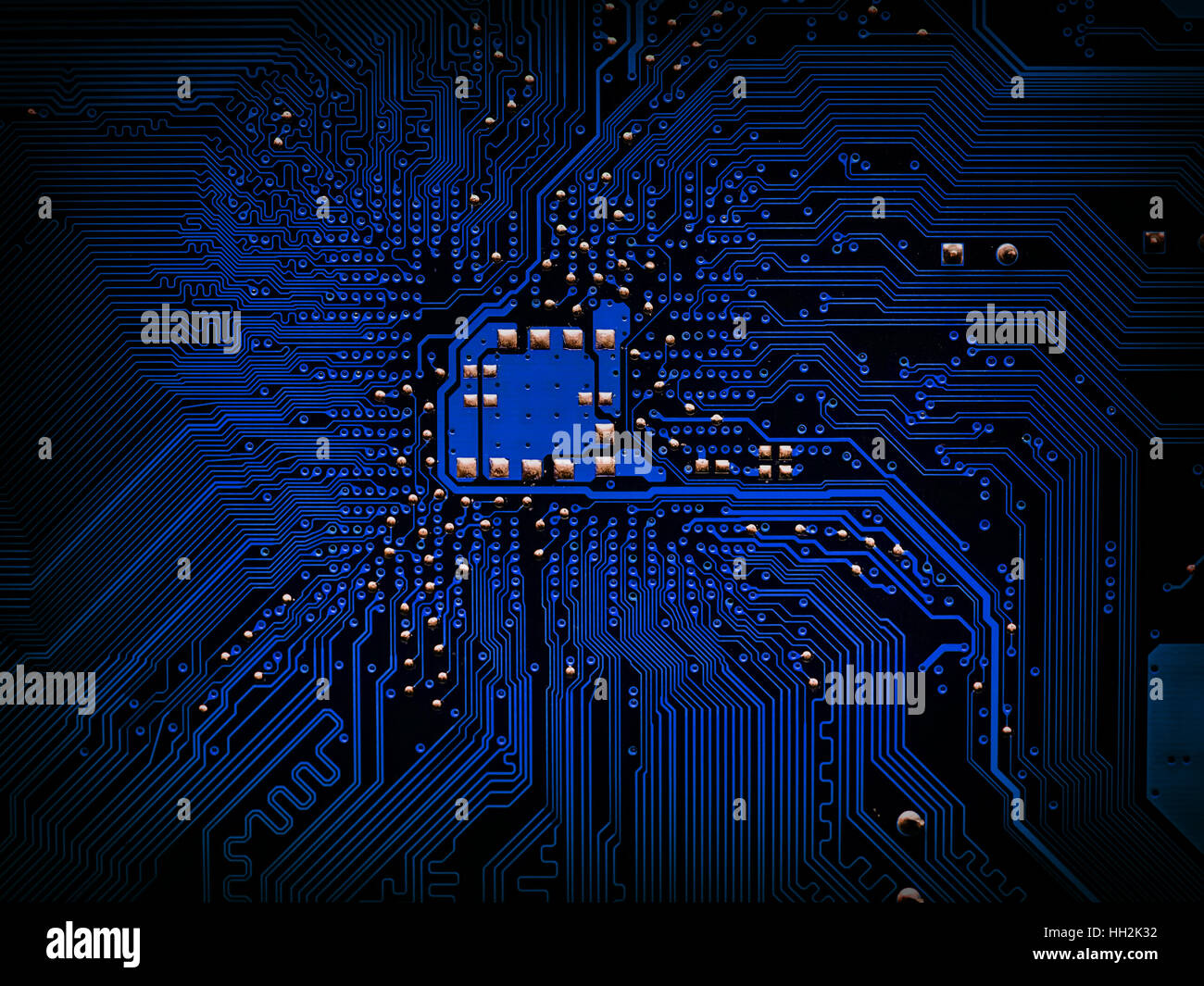 Closeup electronic circuit board background Stock Photo - Alamy