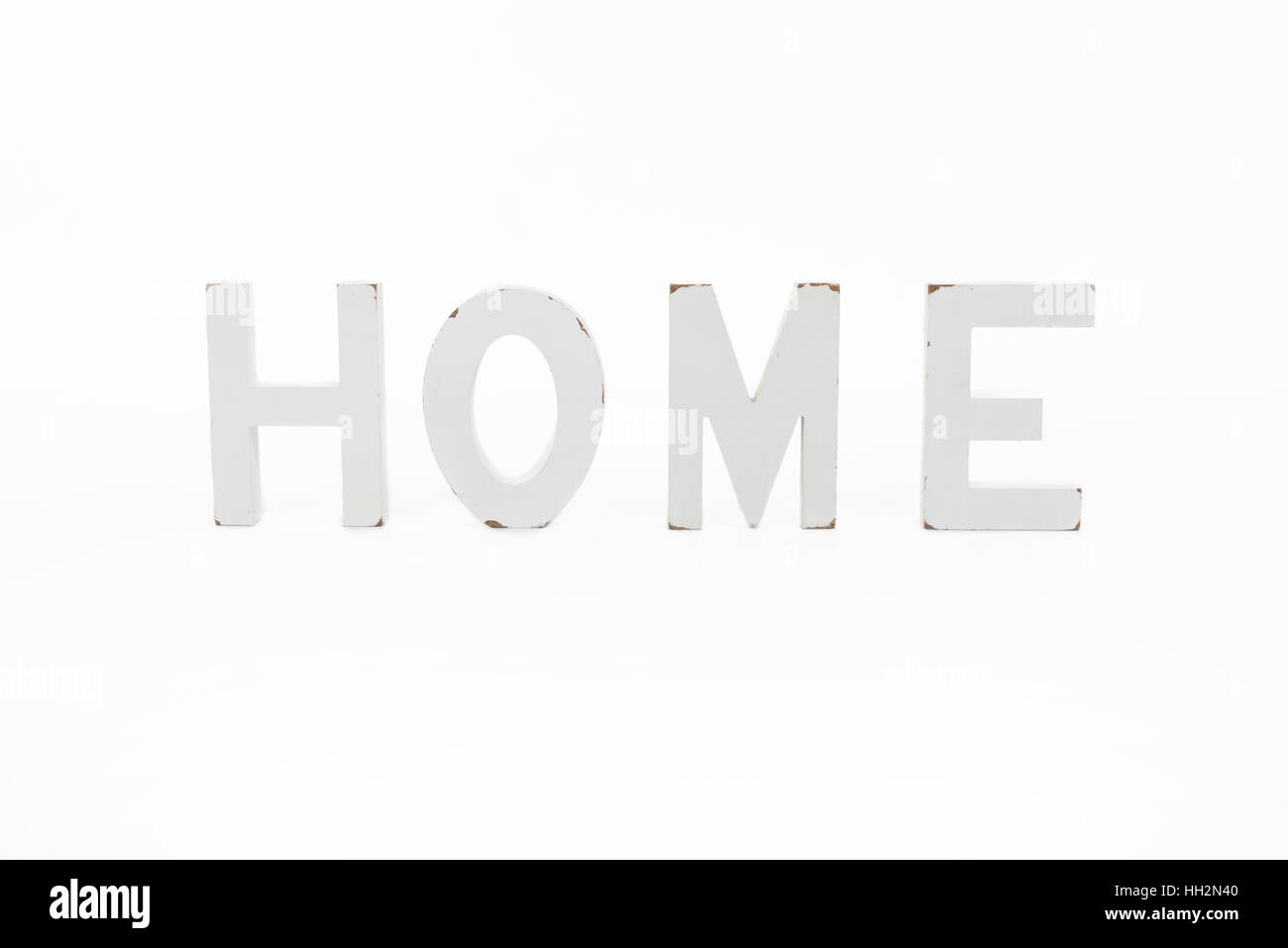 Decorative letters forming word HOME on white background. Rustic ...