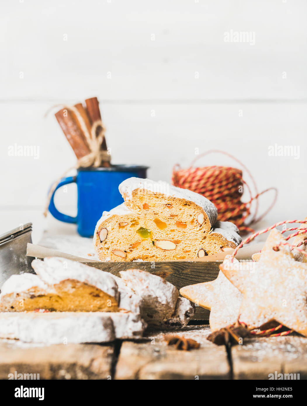 Traditional German Christmas cake Stollen with gingerbread cookies ...
