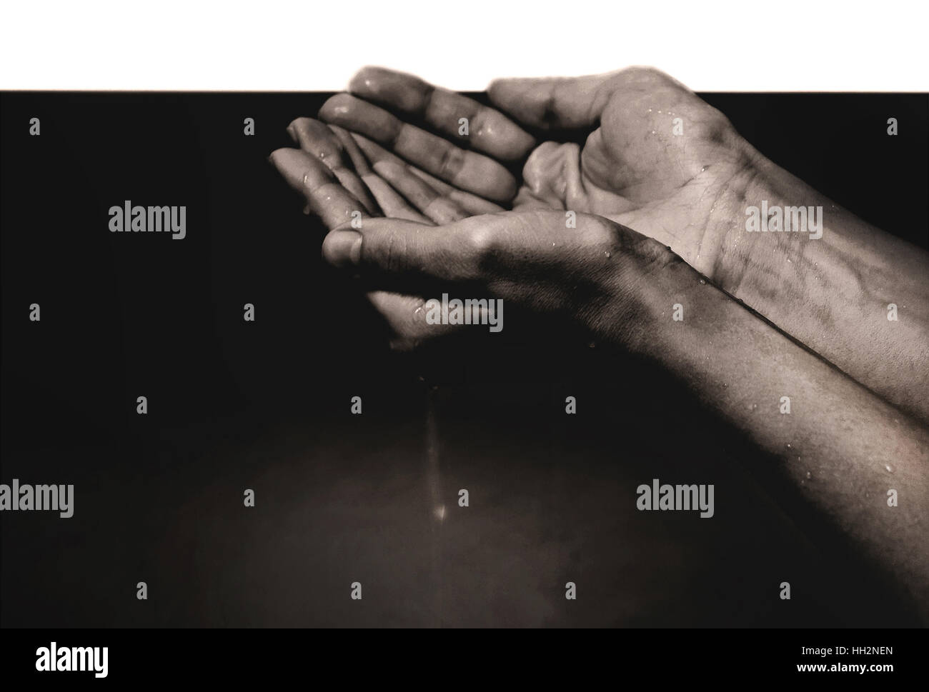 hands in oil Stock Photo - Alamy