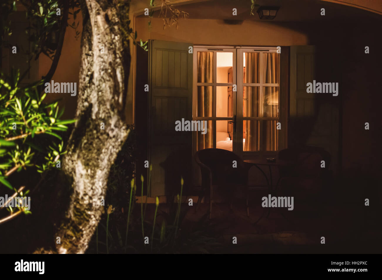 Door of house at night Stock Photo - Alamy