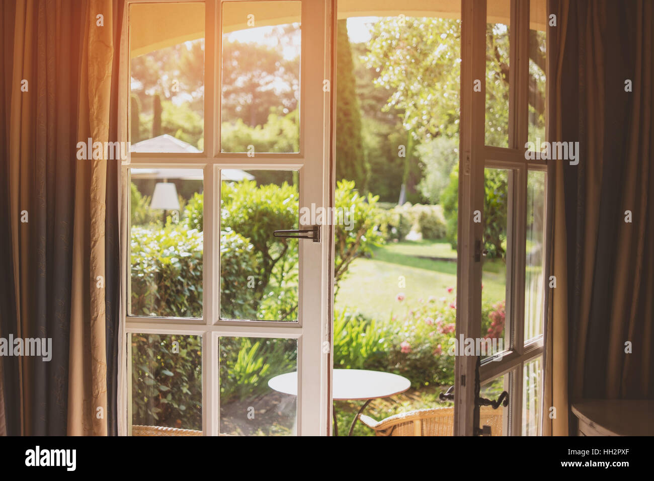 Open door and nature Stock Photo - Alamy