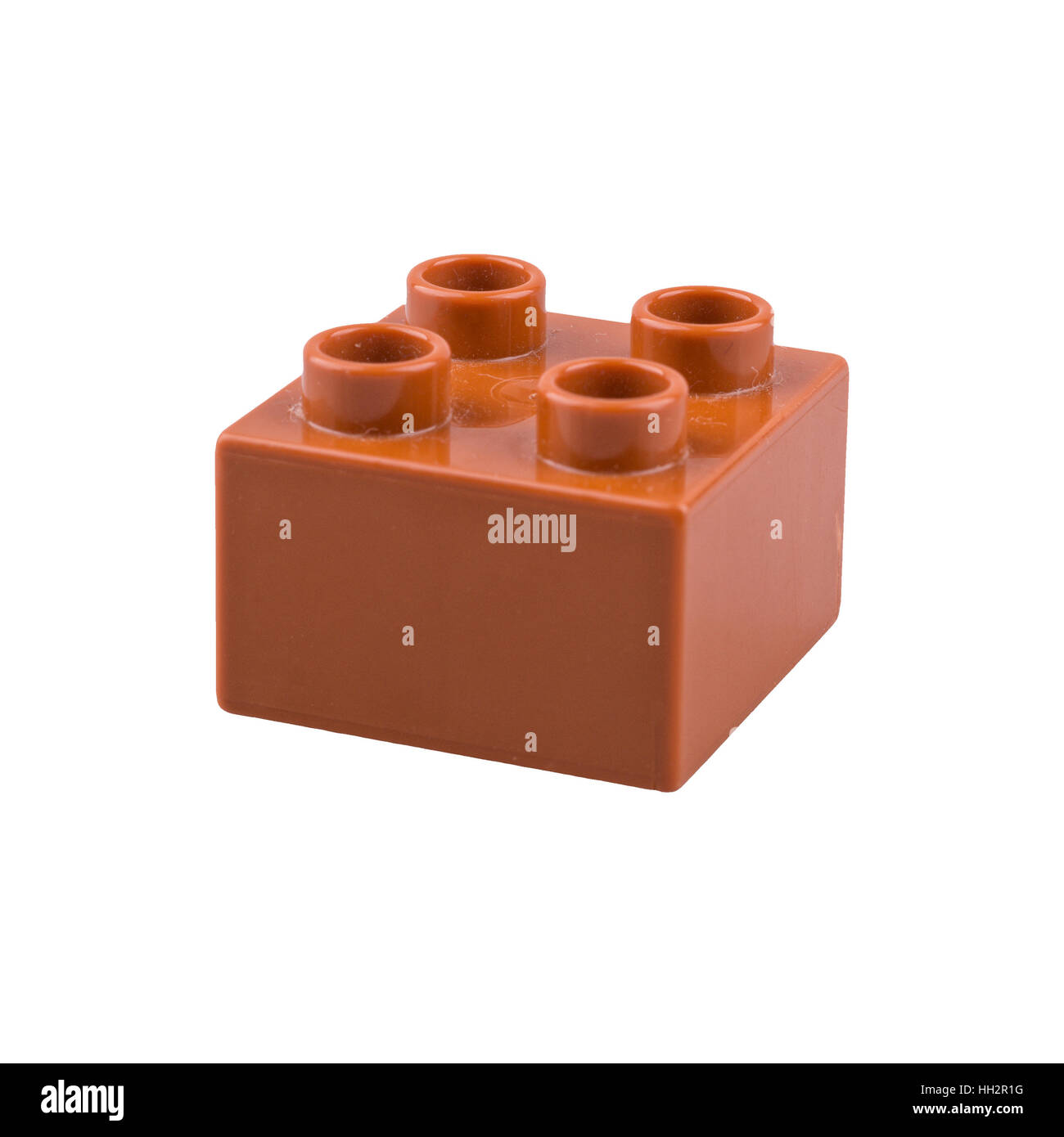 Brown cube isolated on a white background Stock Photo - Alamy