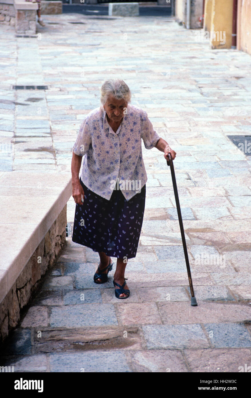 Old or Elderly Woman with Walking Stick Provence France Stock Photo - Alamy