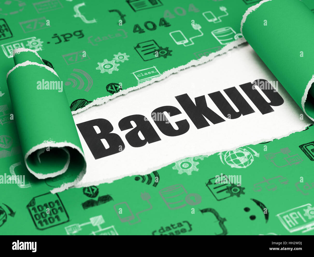 Software concept: black text Backup under the piece of torn paper Stock Photo - Alamy