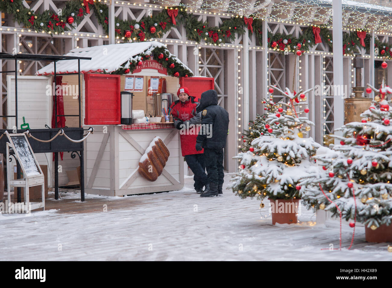 Moscow, Russia. Sunday, January 15, 2017. Unidentified vendor by his ...
