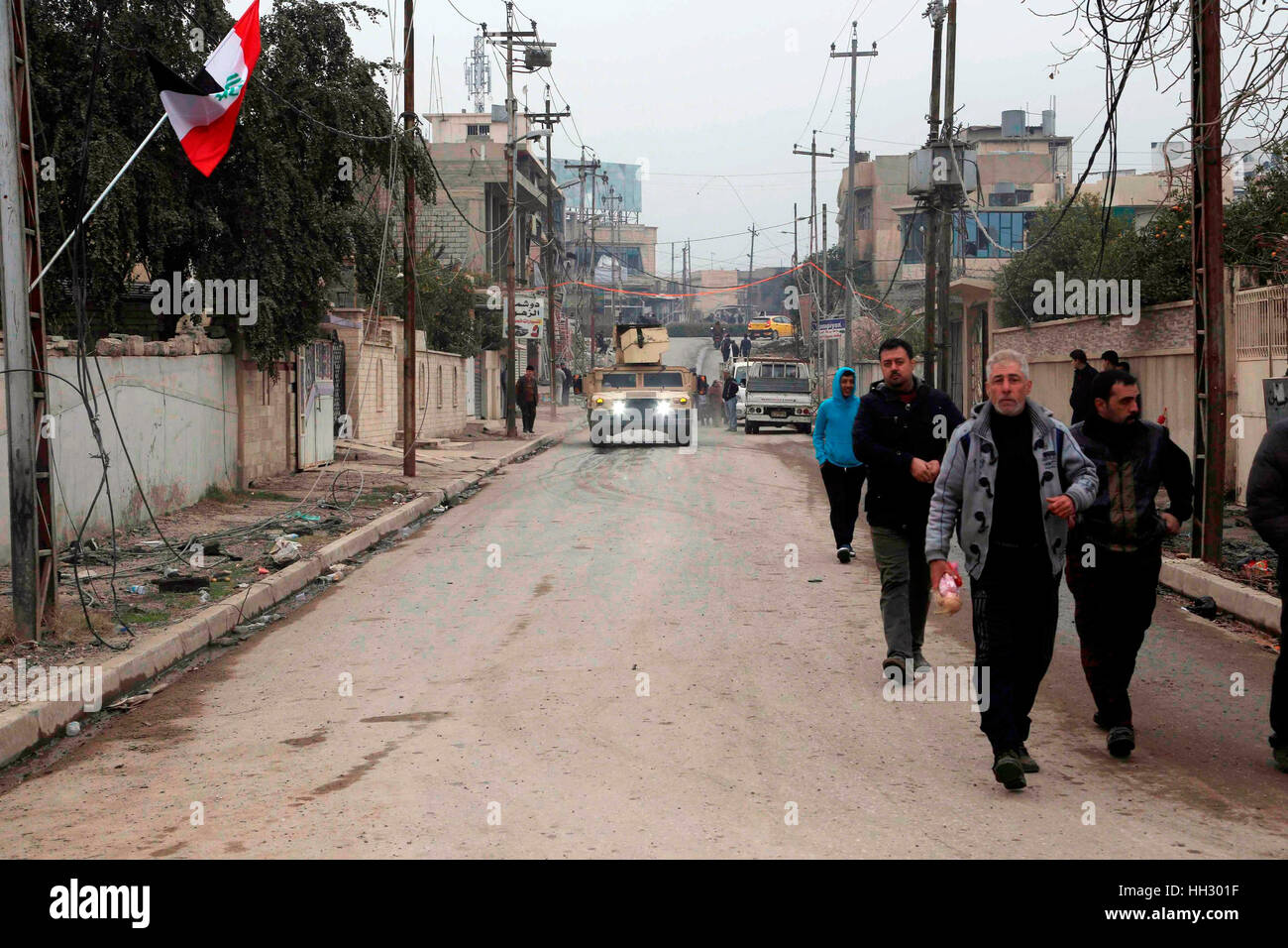 Baghdad, Iraq. 15th January, 2017. Iraqi people walk on a street in ...