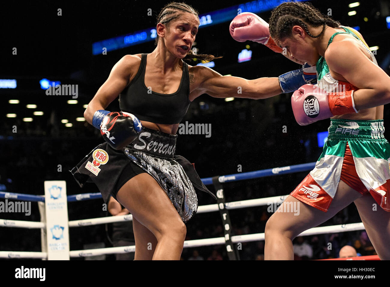 Brooklyn, USA. 14th Jan, 2017. Amanda Serrano (black and silver trunks ...