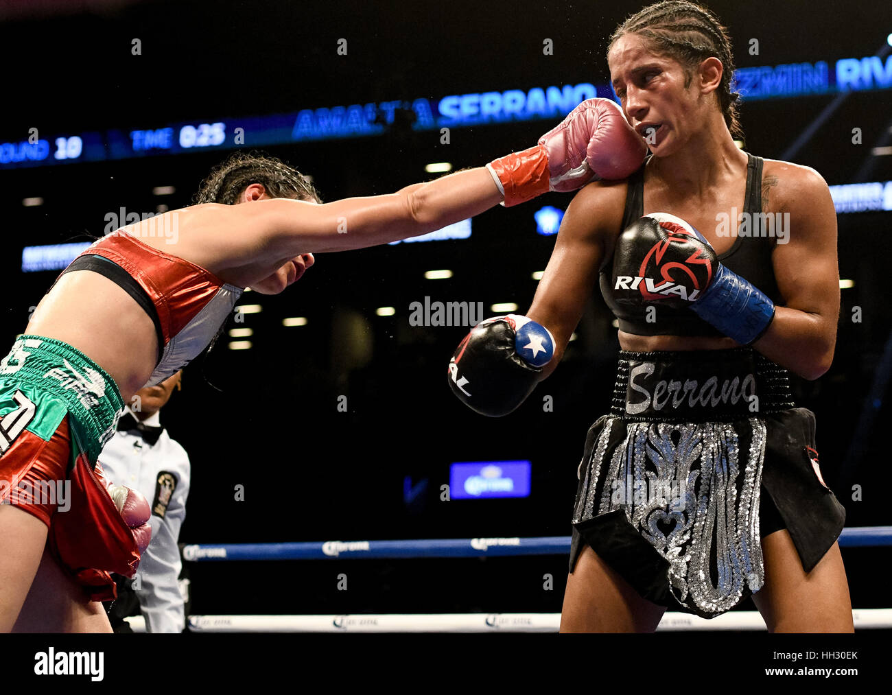 Brooklyn, USA. 14th Jan, 2017. Amanda Serrano (black and silver trunks ...