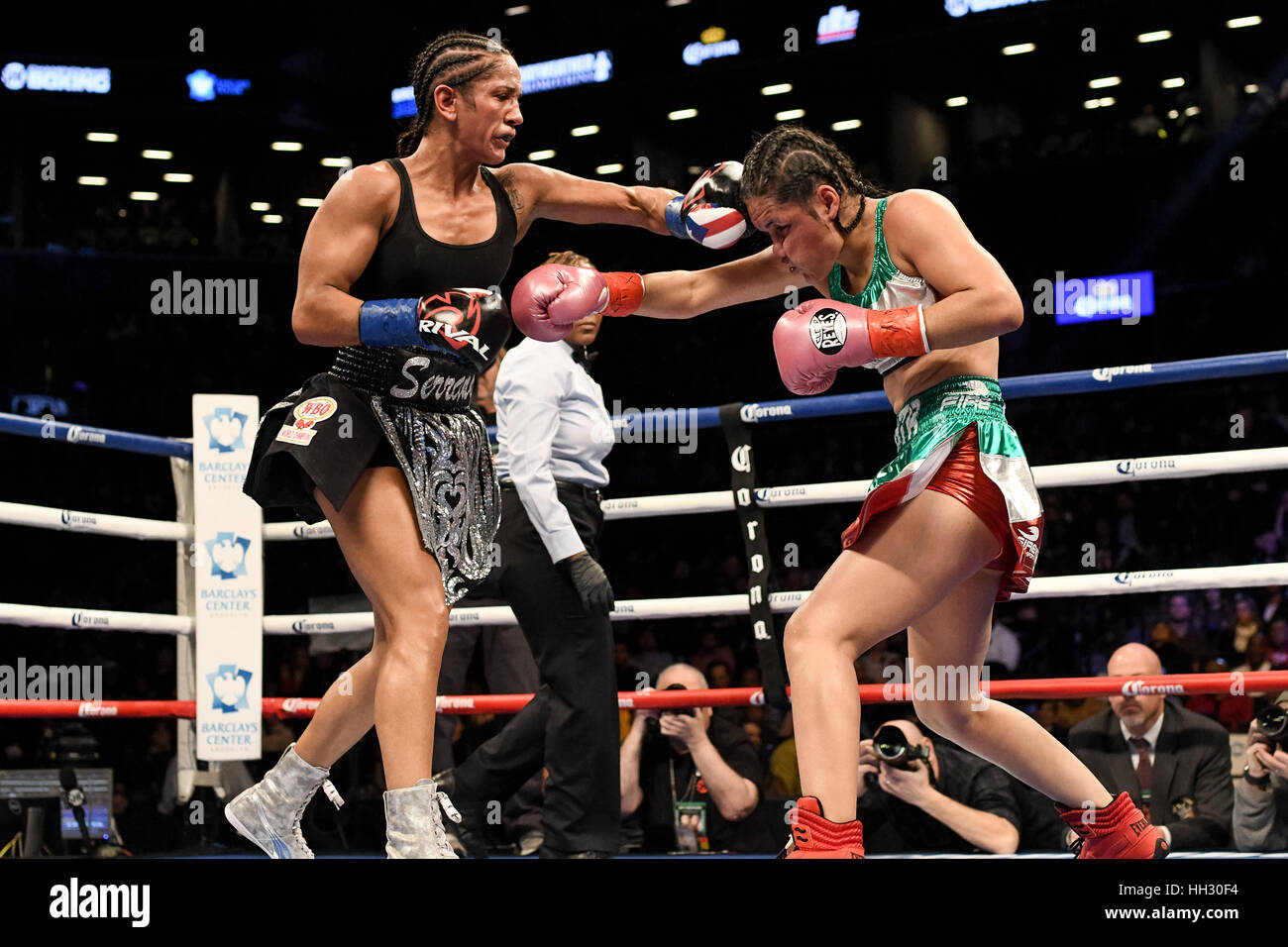 Brooklyn, USA. 14th Jan, 2017. Amanda Serrano (black and silver trunks ...