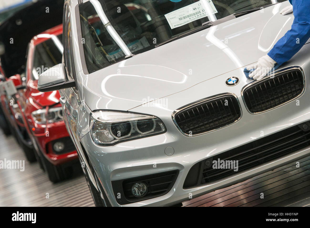 Staff member works on model hi-res stock photography and images - Alamy