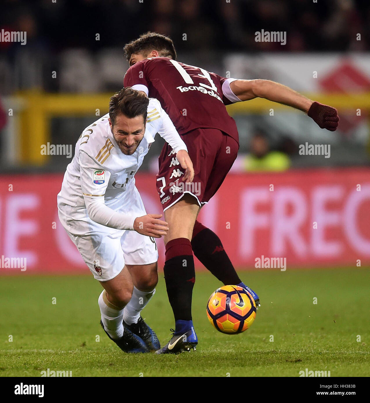 Turin, Italy. 16th Jan, 2017. AC Milan's Andrea Bertolacci (L) competes ...