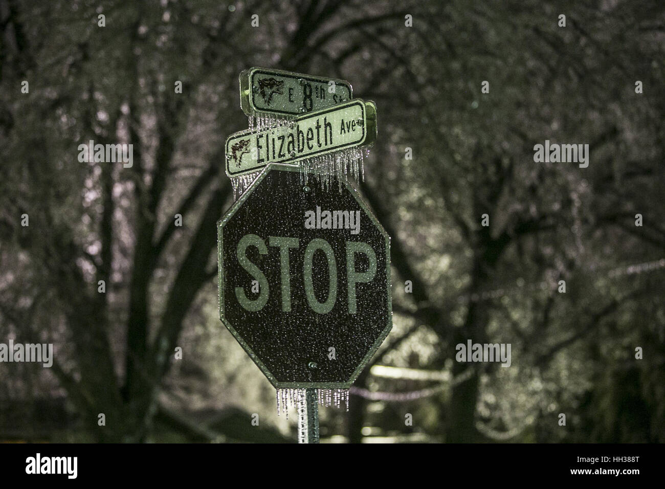 Kinsley, USA. 15th Jan, 2017. An ice coated stop sign glimmers in the ...