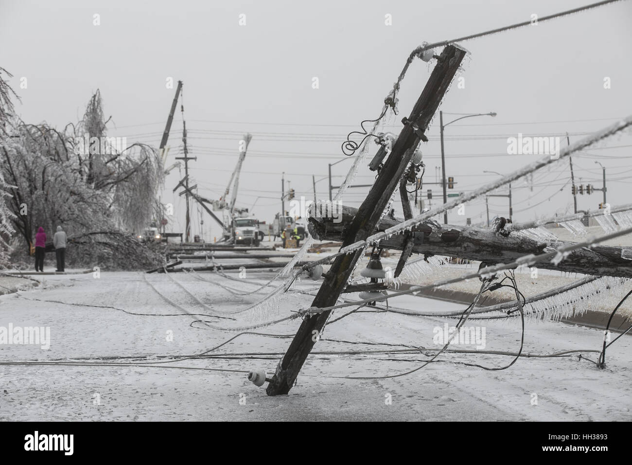 Dodge City, USA. 16th Jan, 2017. A 30 foot wooden power pole lies ...