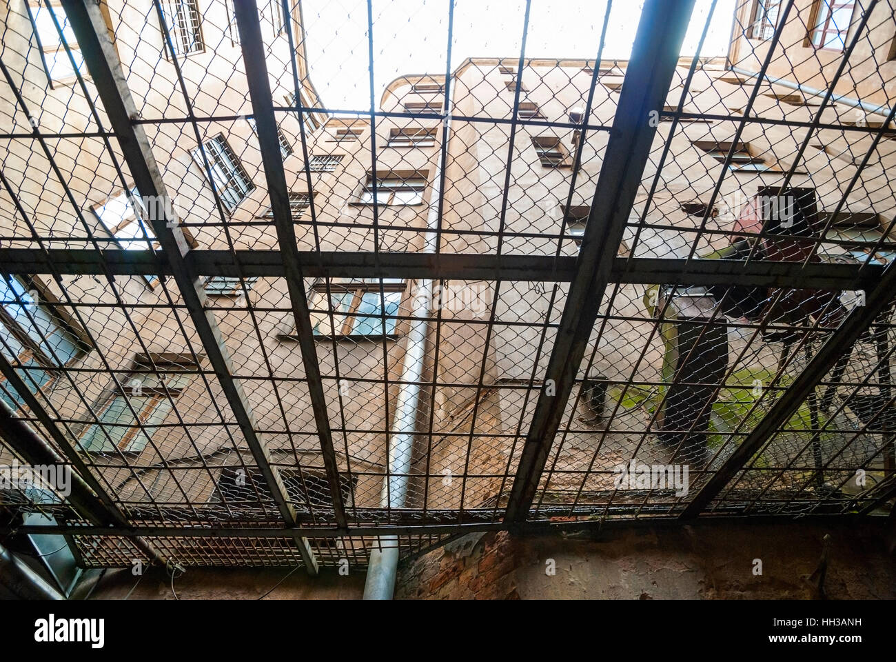 View on ceiling made of metal railings of kgb prison yard in Riga ...