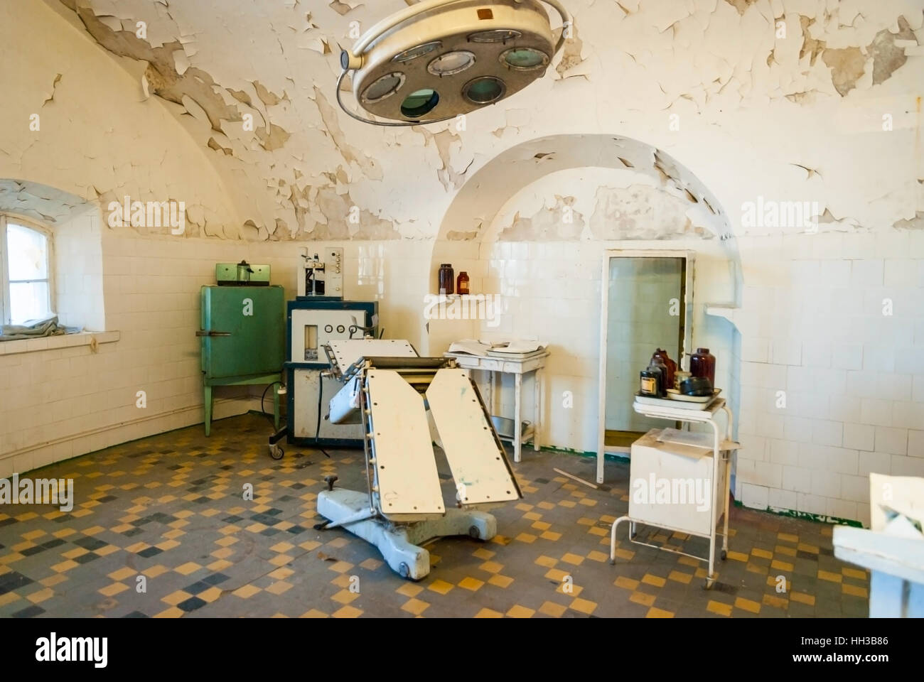View on surgery room interior with operation table in soviet jail in ...