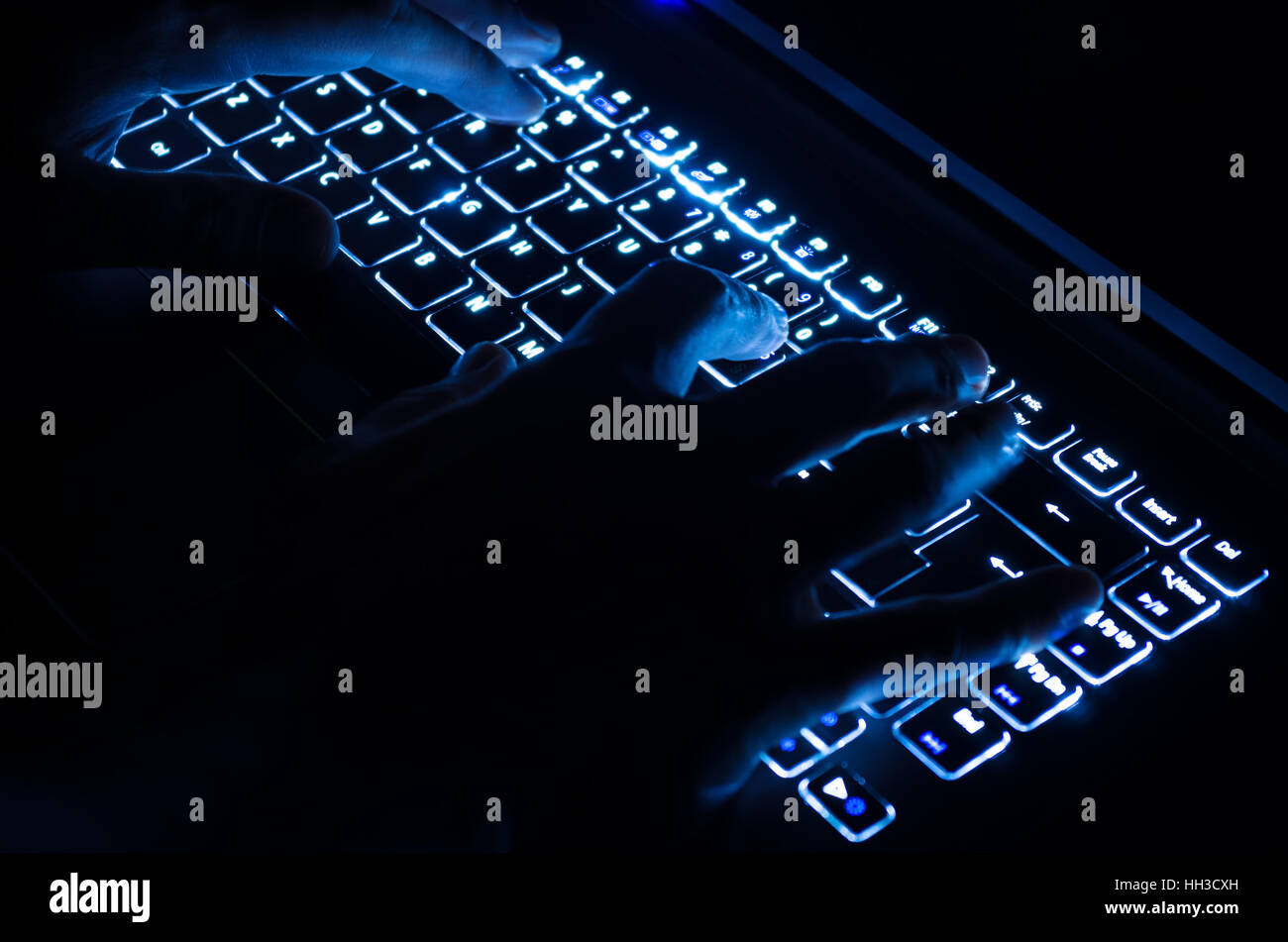Person Typing On Keyboard - Artistic Treatment with Blur and Glow ...