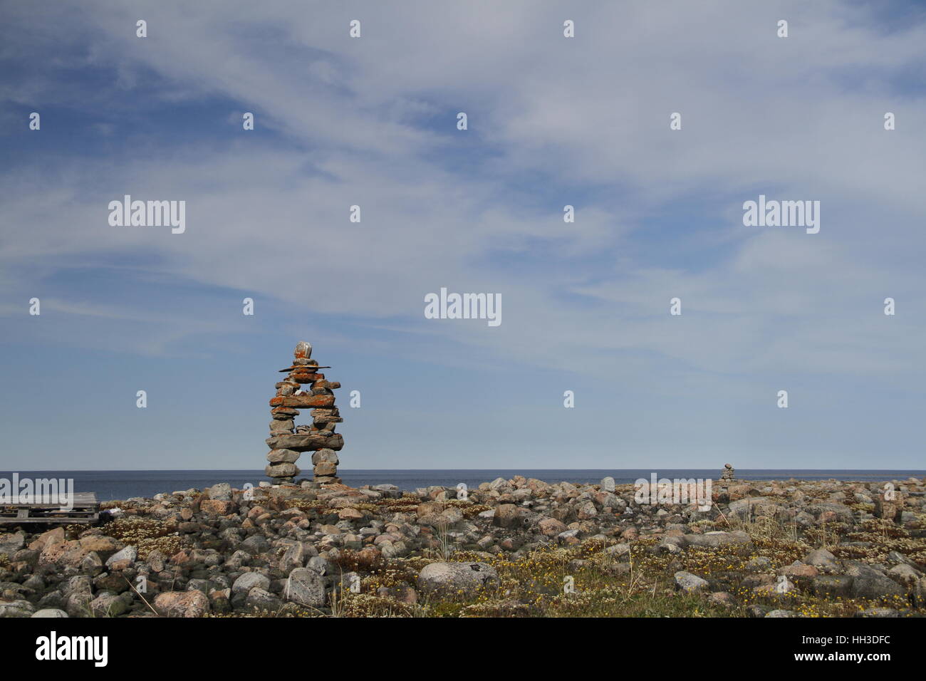 Traditional Inuit landmark (Inukshuk or Inuksuk) near Arviat, Nunavut ...
