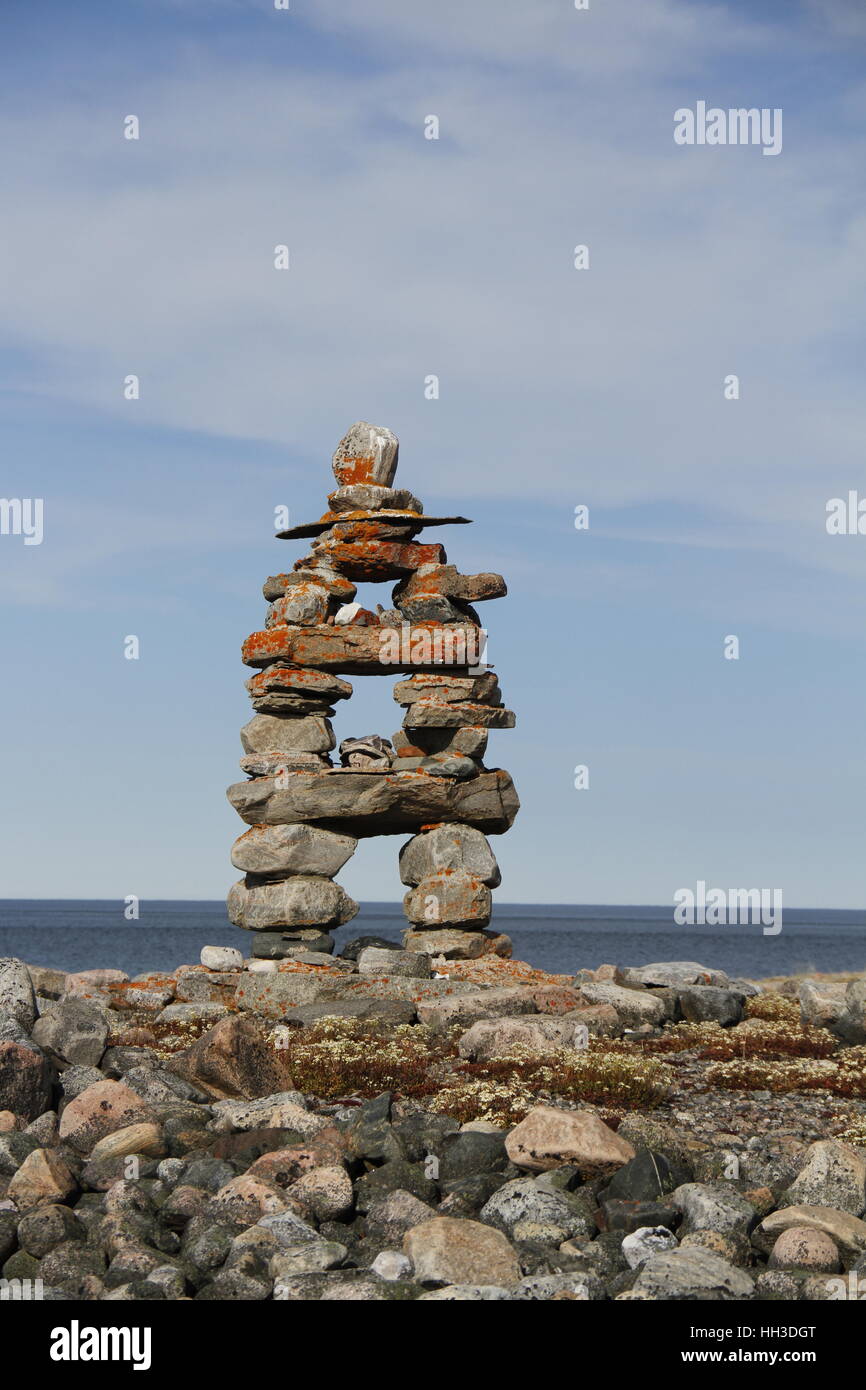 Close-up of traditional Inuit landmark (Inukshuk or Inuksuk) near ...