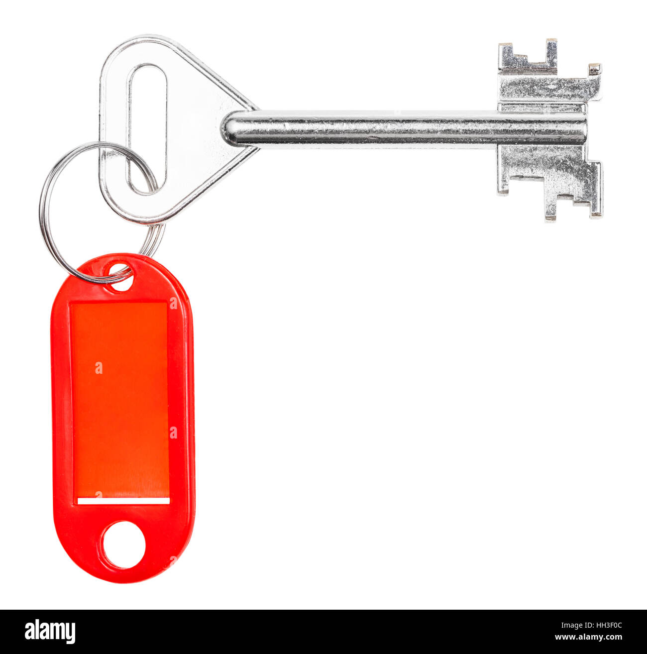 big door key with red blank key chain isolated on white background ...