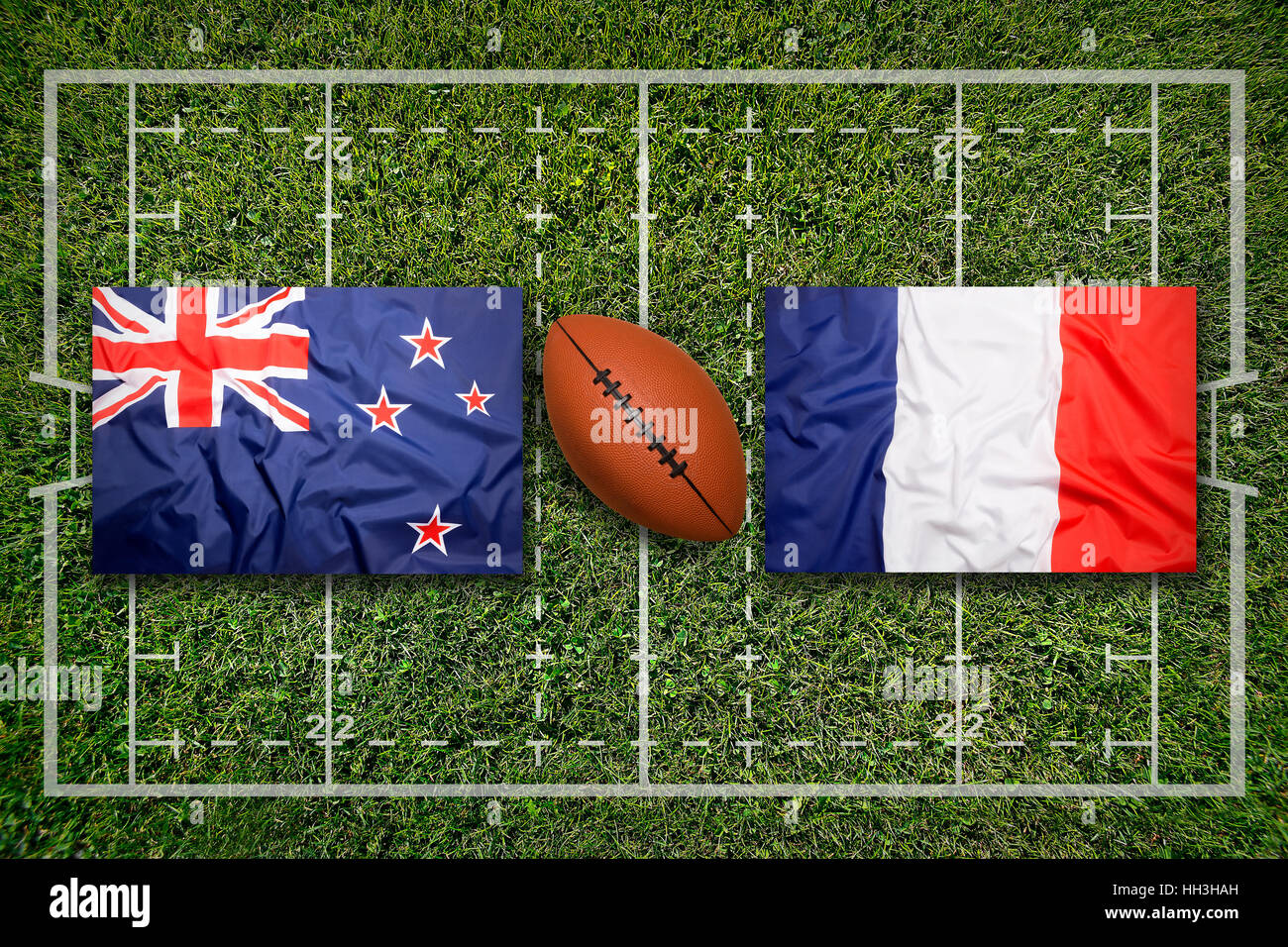 New Zealand vs. France flags on green rugby field Stock Photo - Alamy