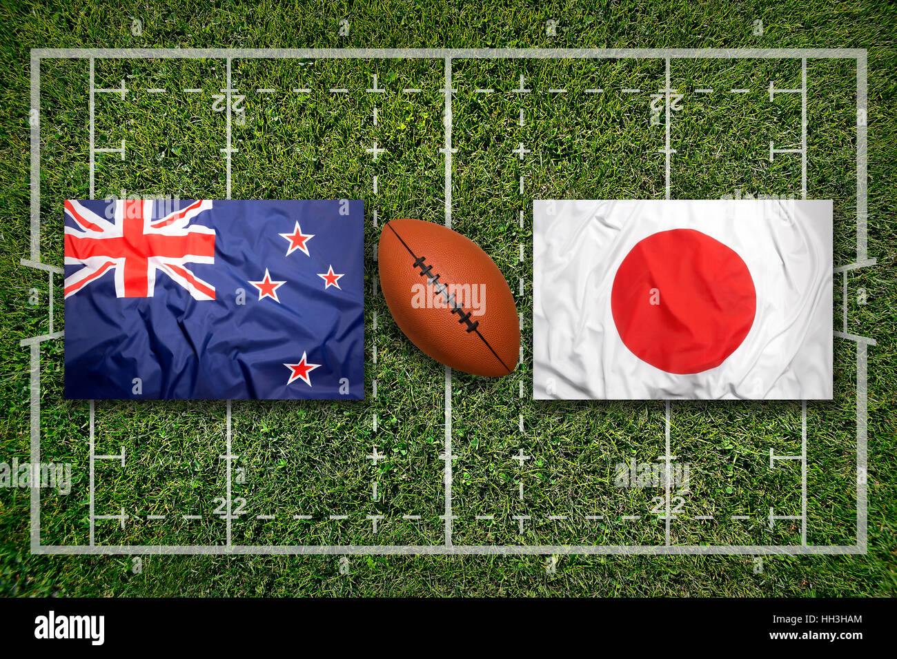 New Zealand vs. Japan flags on green rugby field Stock Photo - Alamy