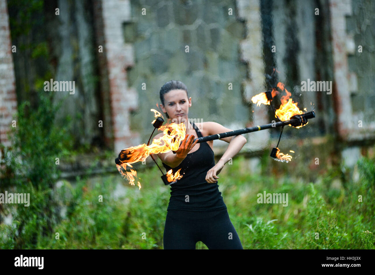 play with fire show on the shore of the sea Stock Photo - Alamy